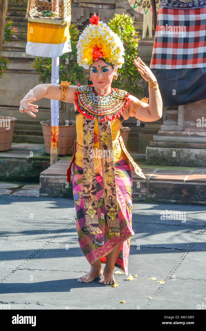 Balinese locals performing Barong, a mythical lion-like creature at a ...