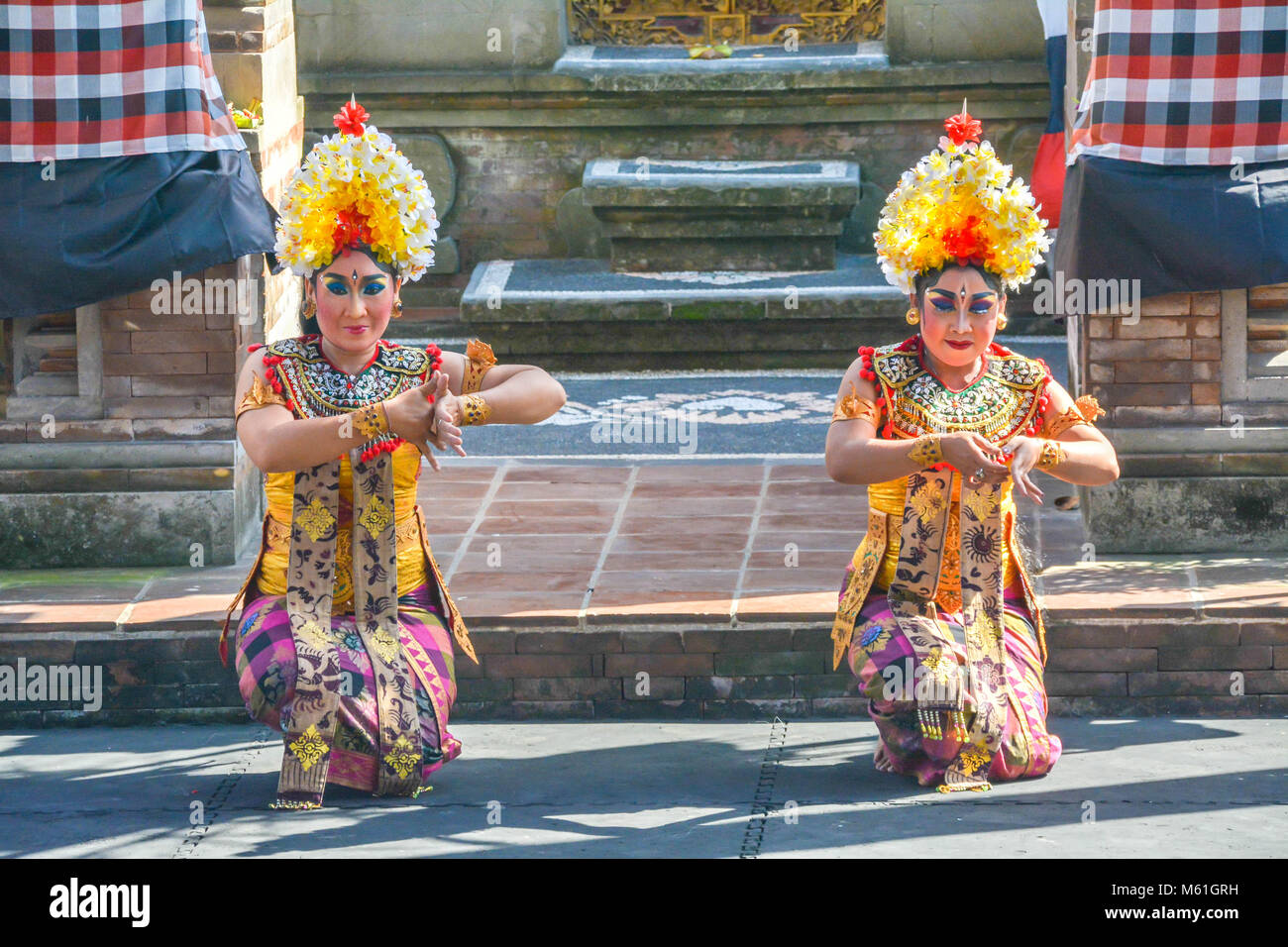 Balinese locals performing Barong, a mythical lion-like creature at a ...