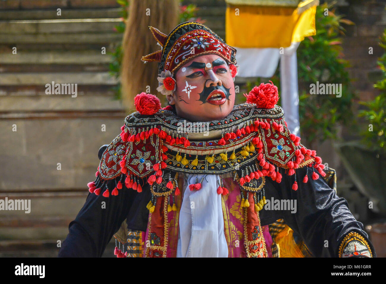 Balinese locals performing Barong, a mythical lion-like creature at a ...