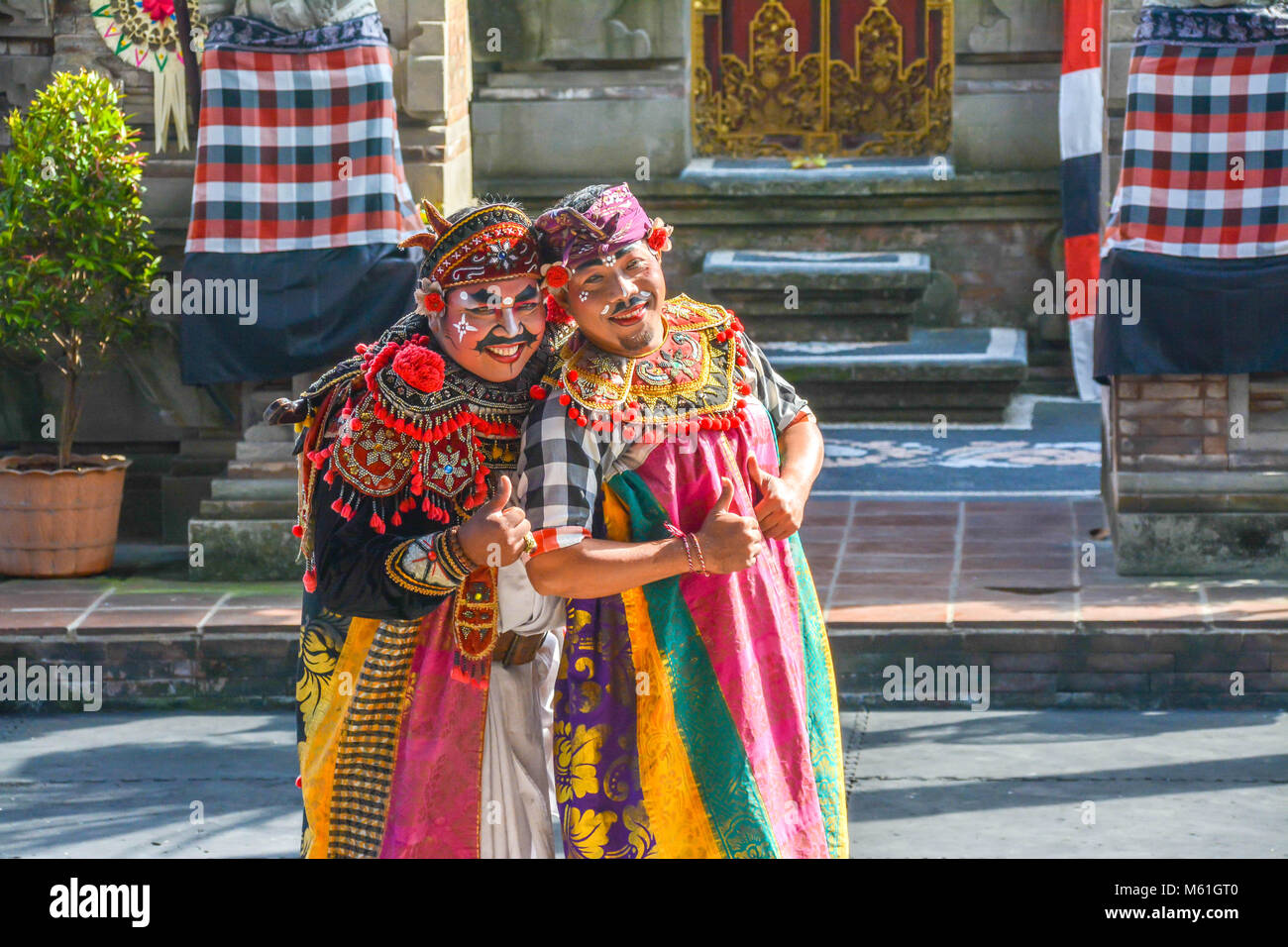 Balinese locals performing Barong, a mythical lion-like creature at a ...