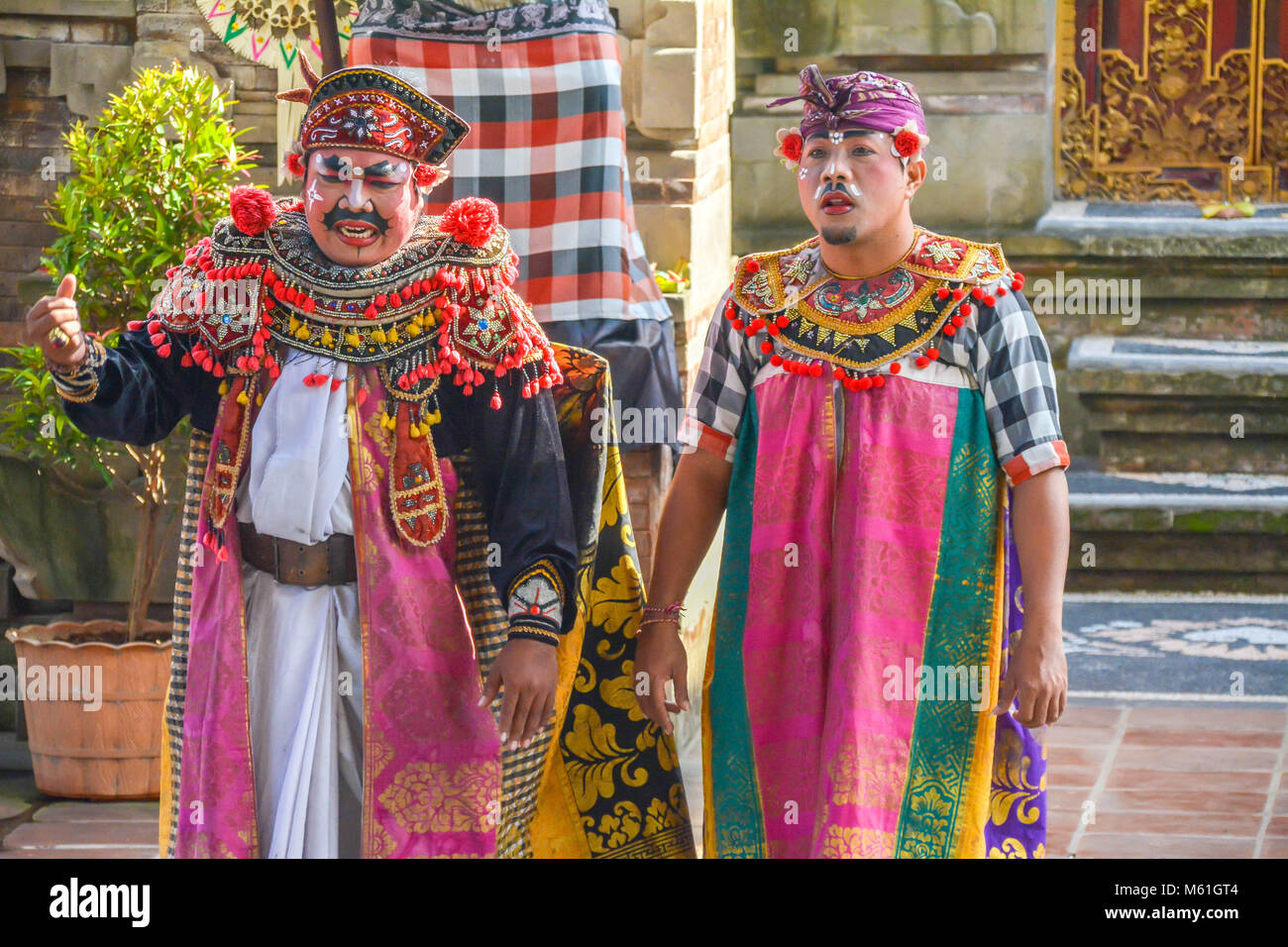 Balinese locals performing Barong, a mythical lion-like creature at a ...