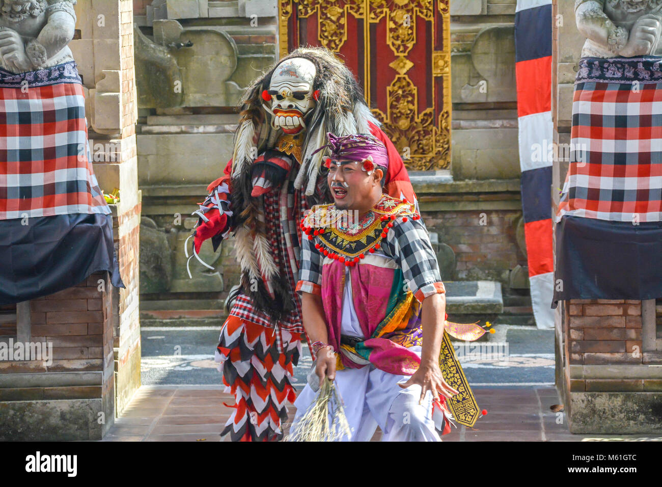 Balinese locals performing Barong, a mythical lion-like creature at a ...