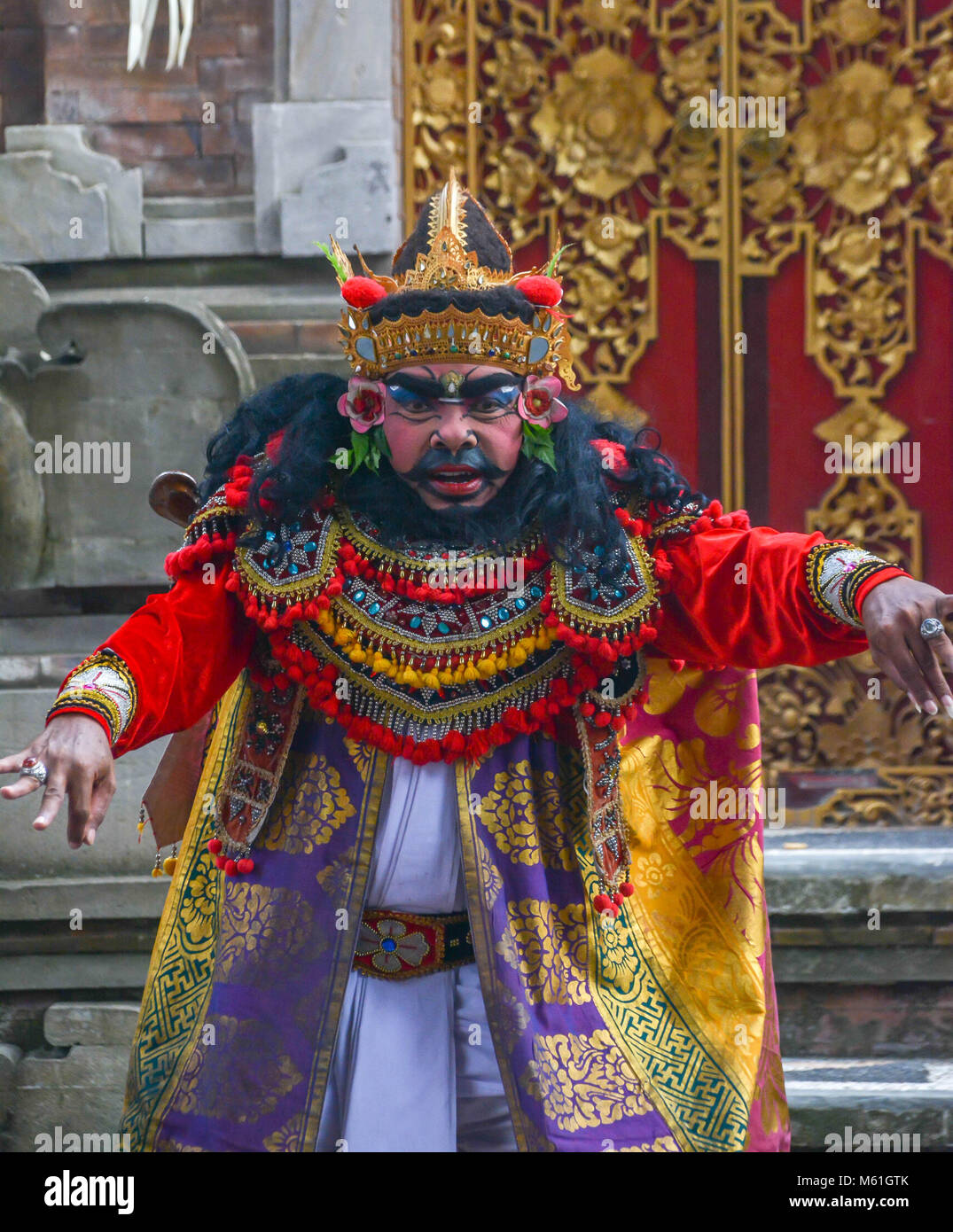 Balinese locals performing Barong, a mythical lion-like creature at a ...