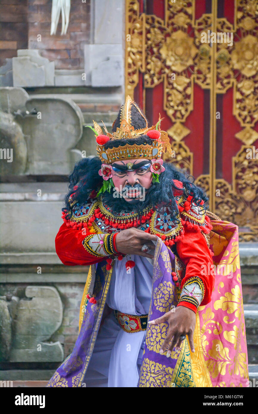 Balinese locals performing Barong, a mythical lion-like creature at a ...