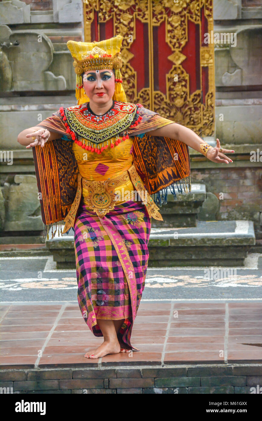 Balinese locals performing Barong, a mythical lion-like creature at a ...