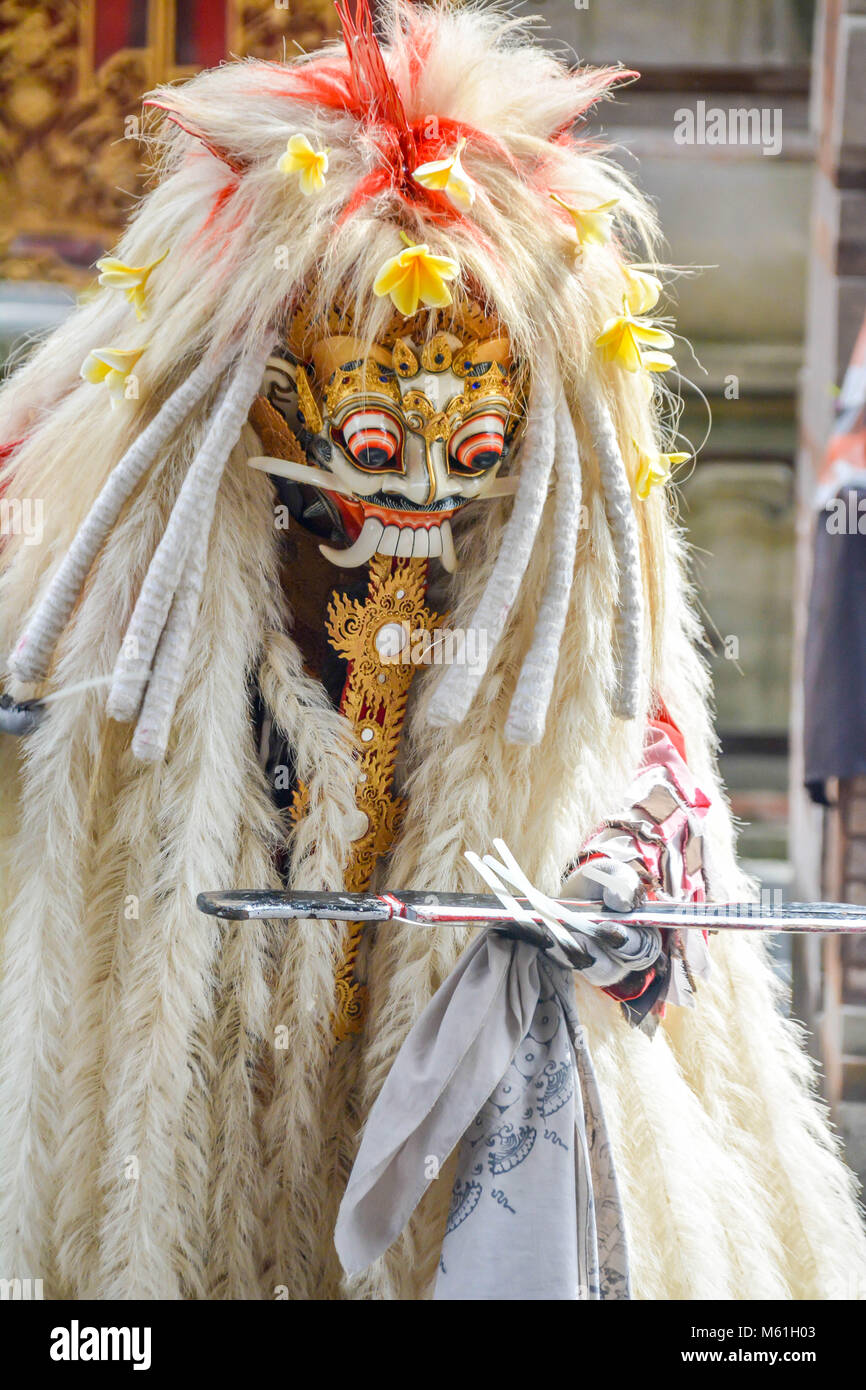 Balinese locals performing Barong, a mythical lion-like creature at a ...