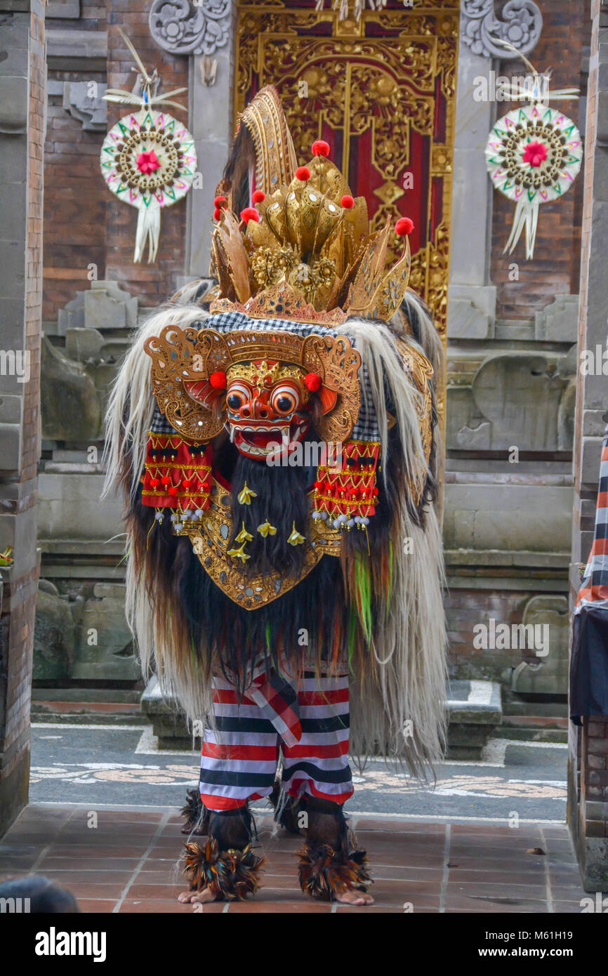Balinese locals performing Barong, a mythical lion-like creature at a ...