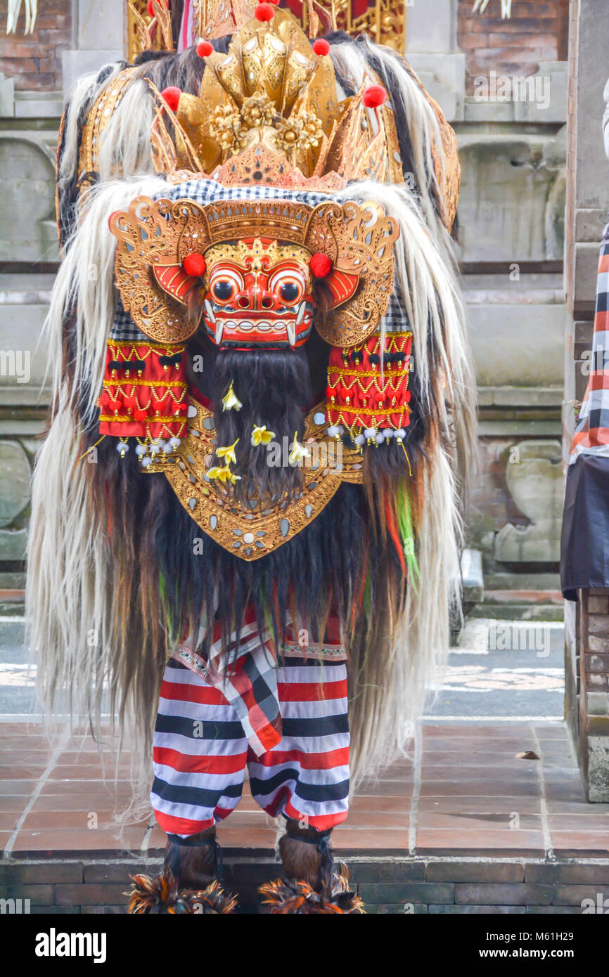 Balinese locals performing Barong, a mythical lion-like creature at a ...