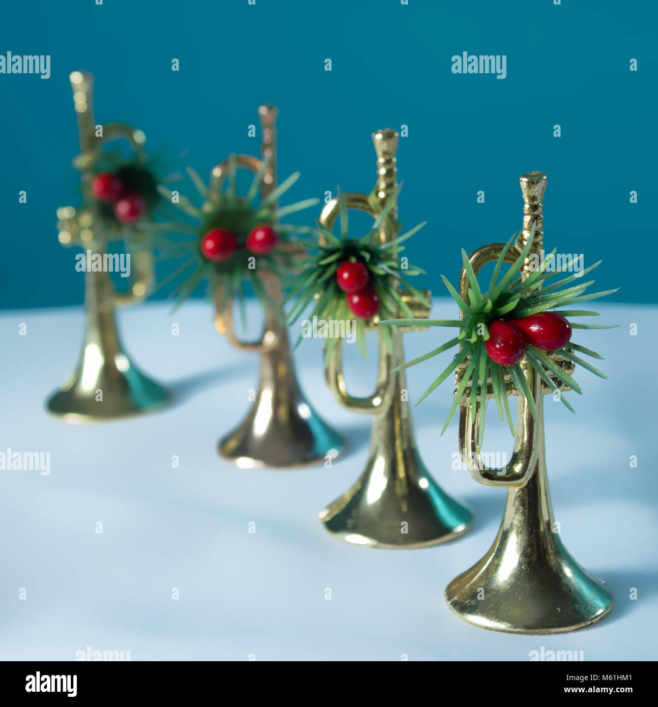 The four trumpets festively decorated with a blue and white background ...