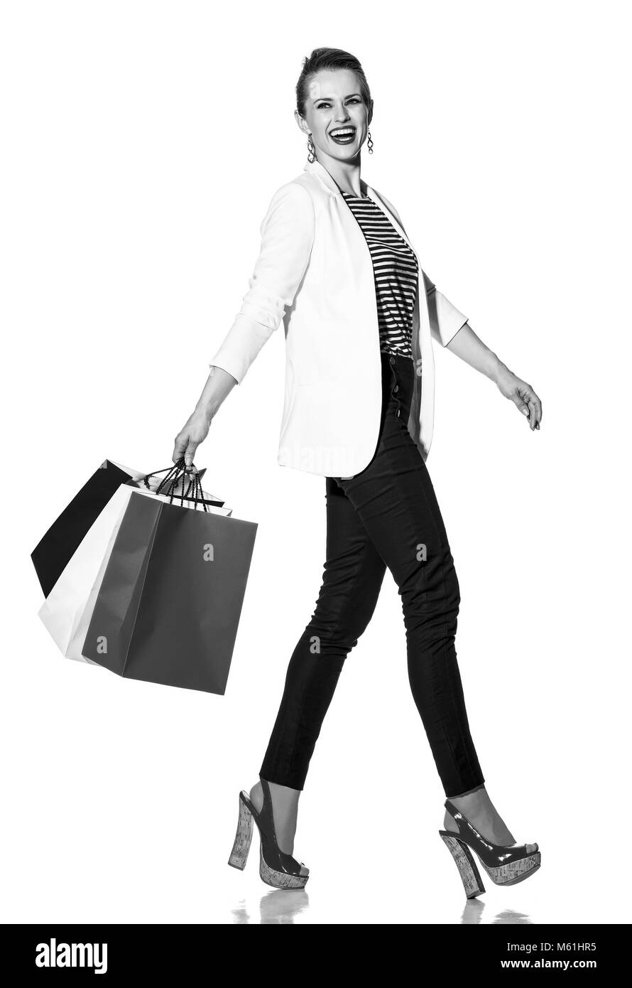 Luxury Shopping. The French way. Full length portrait of smiling young ...