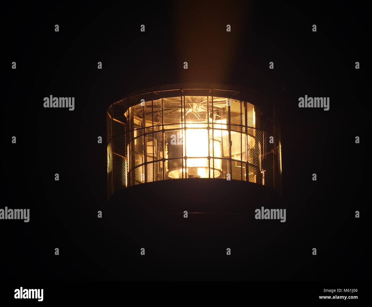Detail of turning lamp in lighthouse. Detail of Fresnel lens. Tower ...