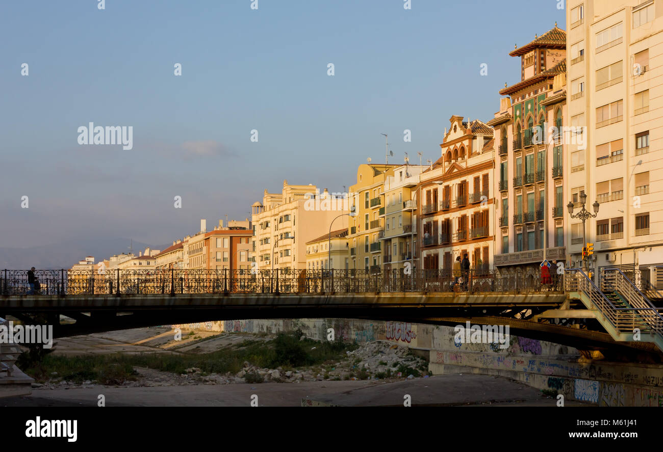 Pedestrian bridge over Guadalmedina dry river in Malaga, Spain Stock ...