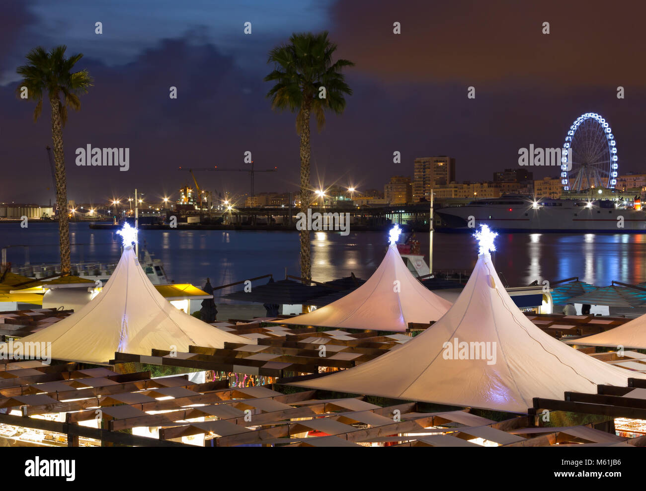 Night view of the waterfront of Malaga city, Spain Stock Photo - Alamy