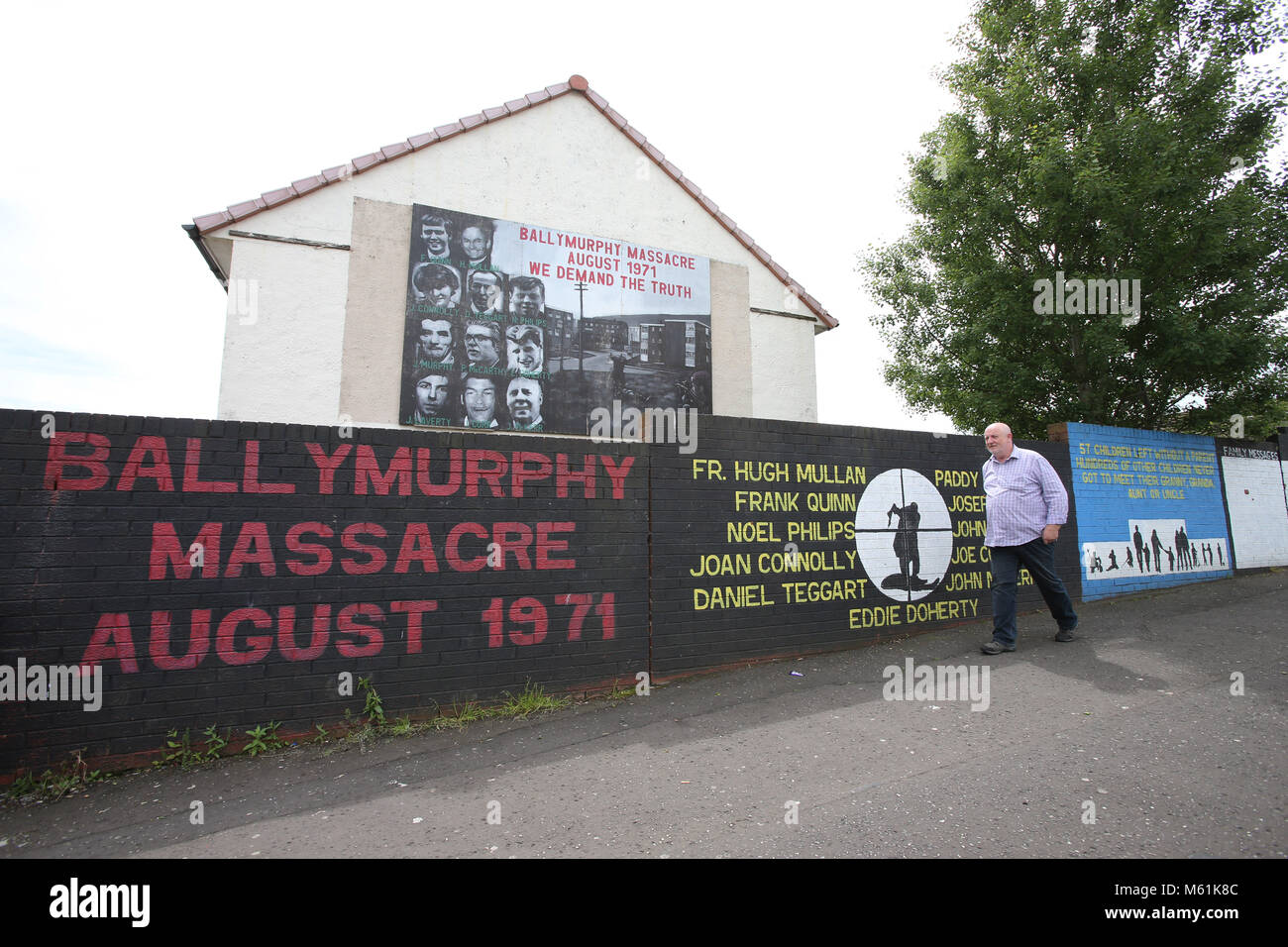 Murals dedicated to the 1971 Ballymurphy Massacre seen on a wall in ...