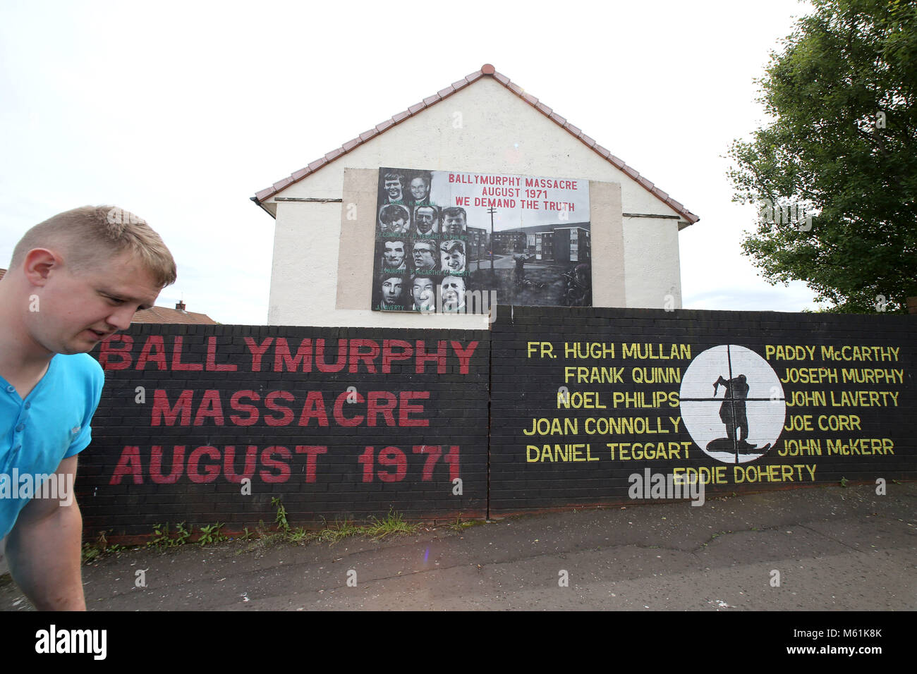 Murals dedicated to the 1971 Ballymurphy Massacre seen on a wall in ...