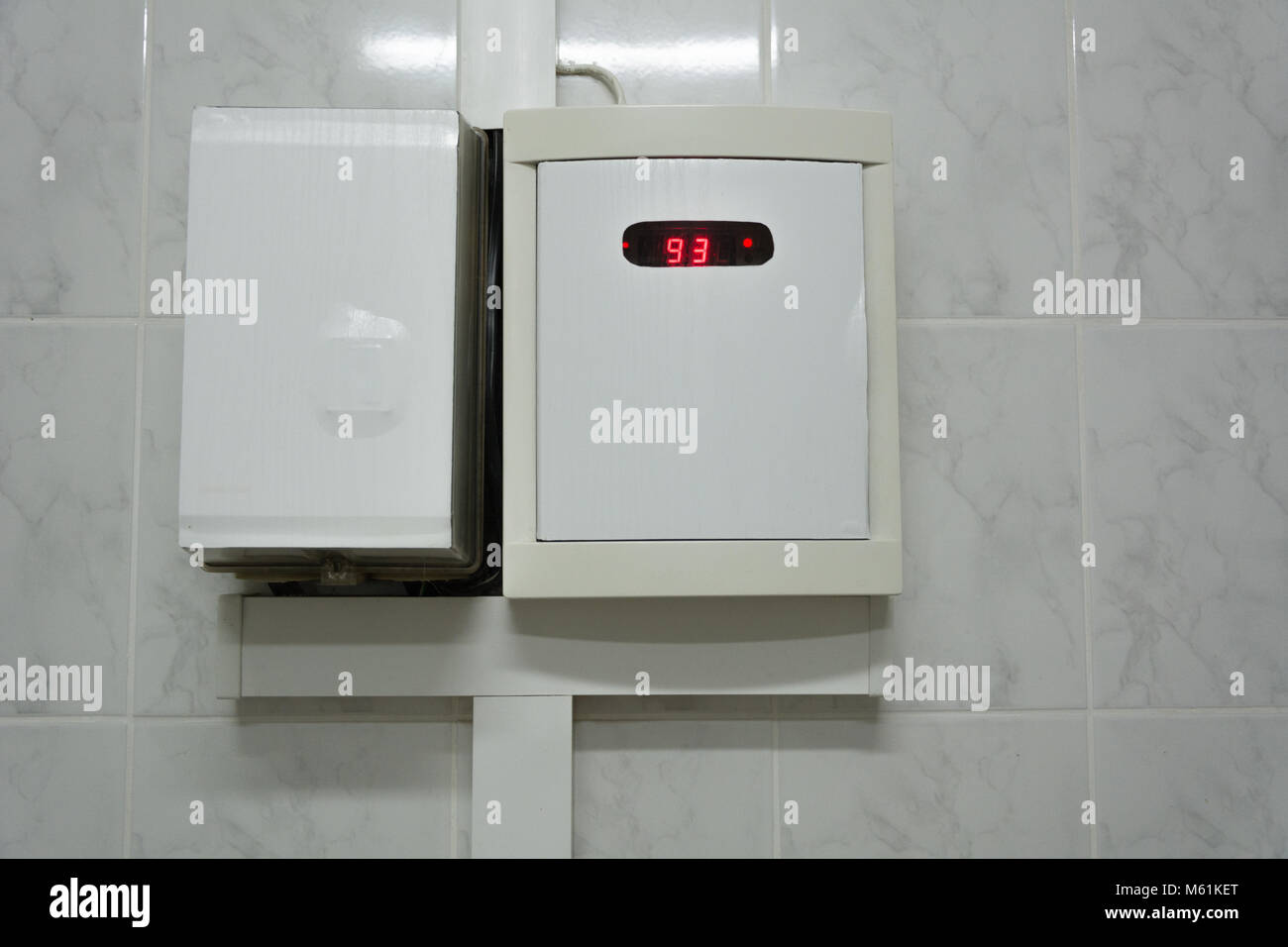 Temperature sensor in the sauna. The temperature is 93 degrees Stock ...