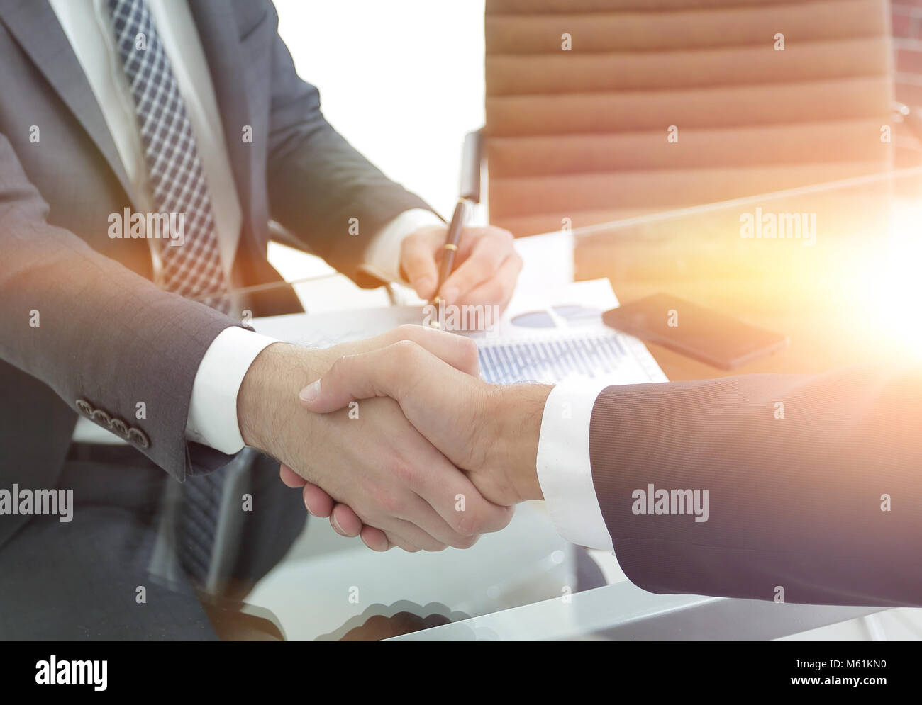 closeup. handshake between the financial Manager and the client Stock ...