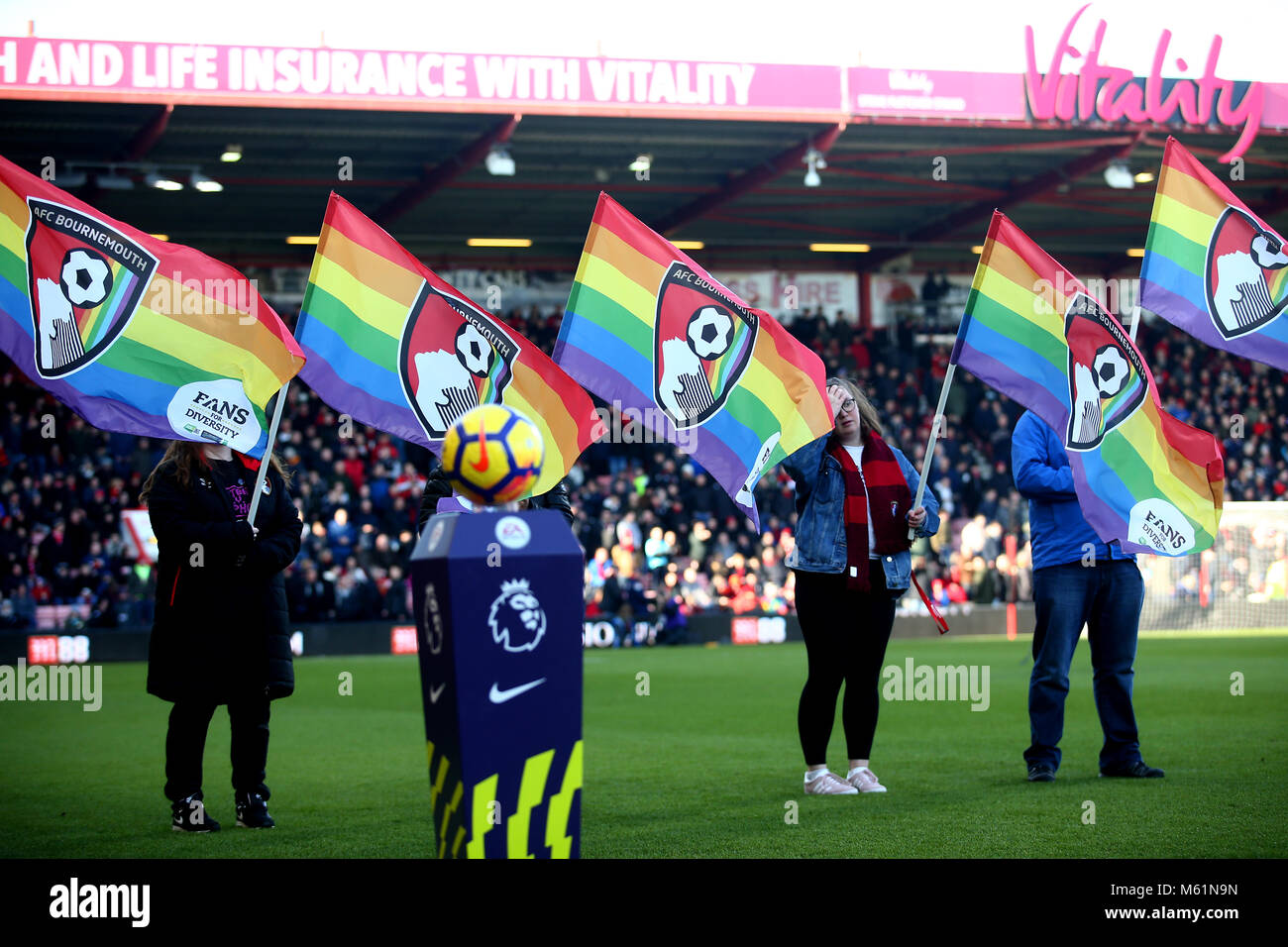 Mascots hold Diversity flags before kick-off Stock Photo - Alamy