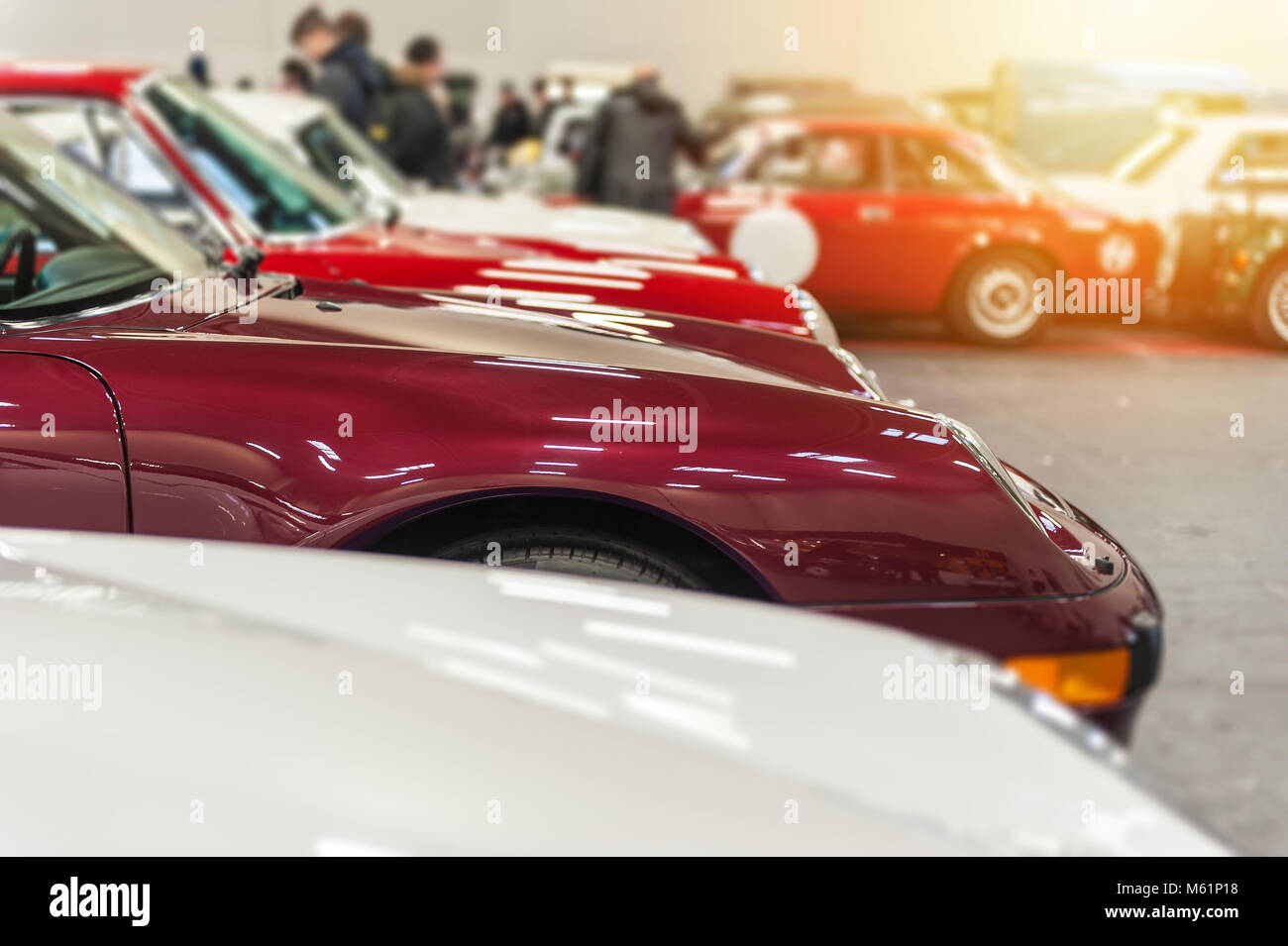 View of many cars in a showroom with sunlight Stock Photo - Alamy