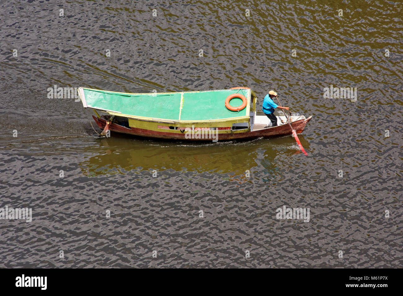 Sampan crossing the Sarawak River in Kuching Stock Photo - Alamy