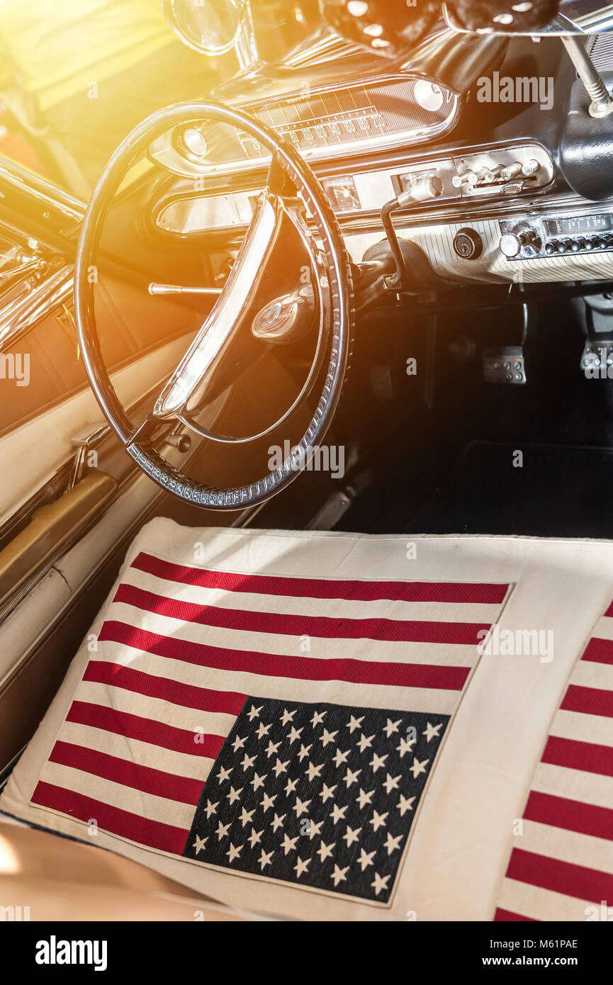 USA flag on seat of a car with sunlight Stock Photo - Alamy