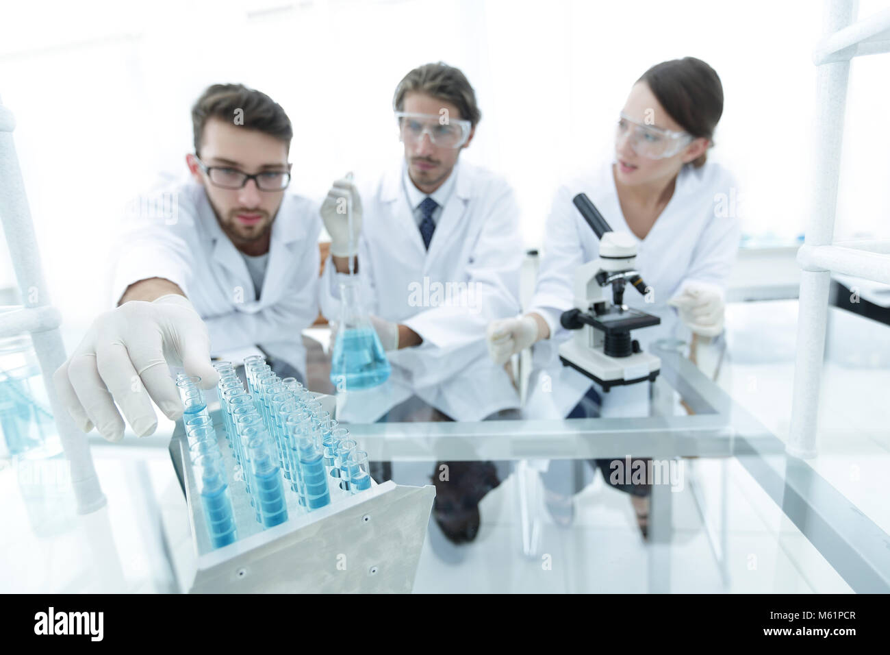 Portrait of a group of researchers conducting research Stock Photo - Alamy