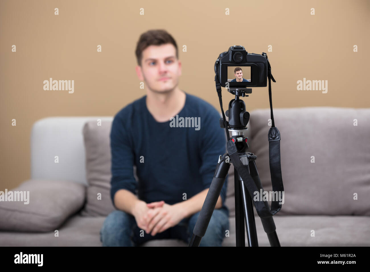 Close-up Of A Male Blogger Recording Video With Camera Stock Photo - Alamy