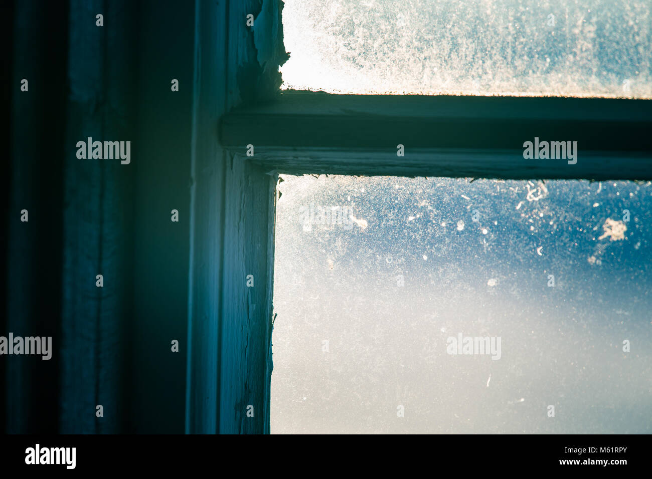 Beautiful wooden window with frozen ice flowers in Norwegian town Stock ...