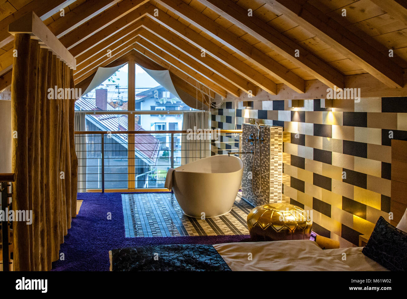 Would you like a bubble bath in the free-standing panoramic tub? By the ...
