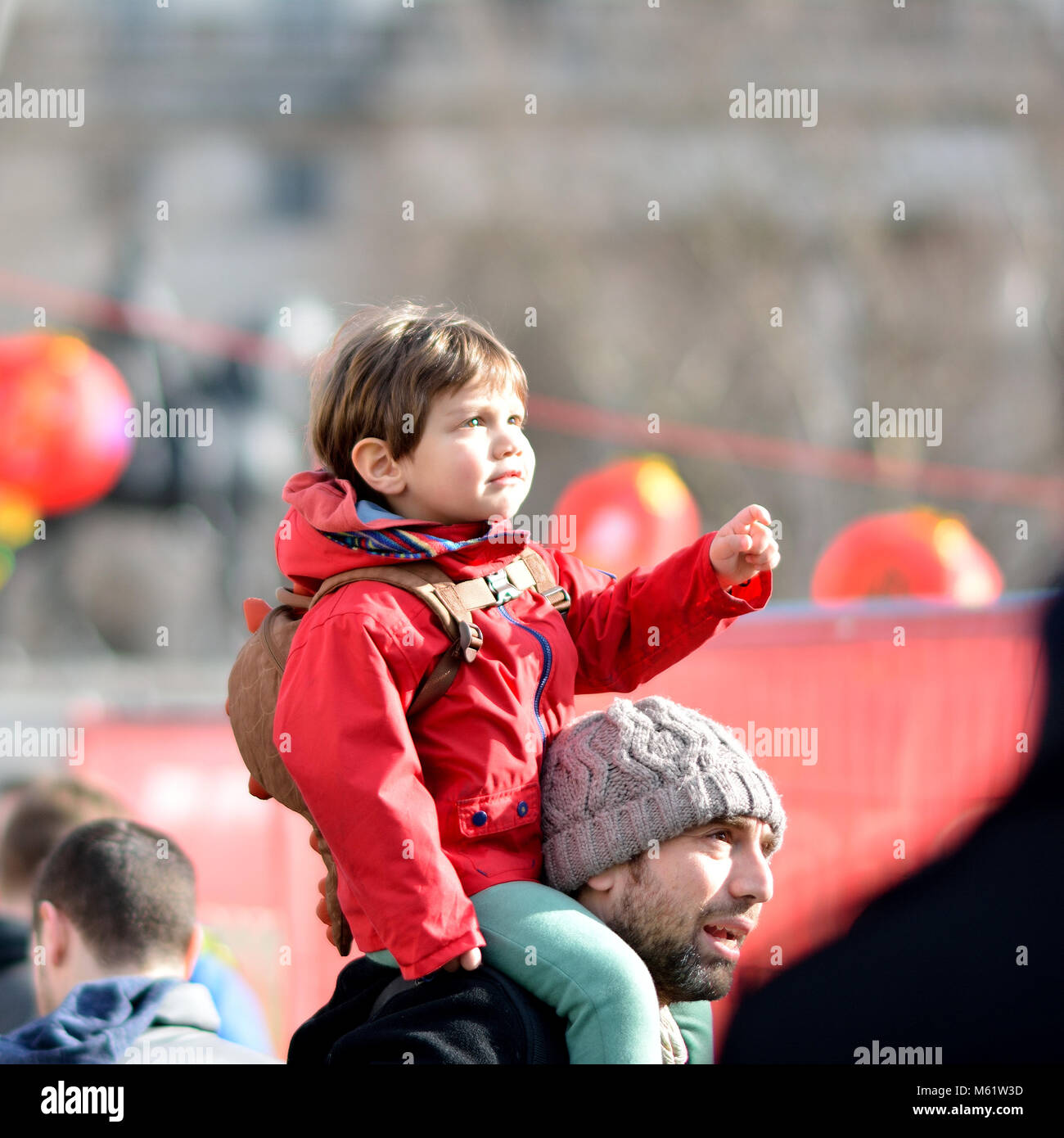 Child sitting on dads shoulders hi-res stock photography and images - Alamy