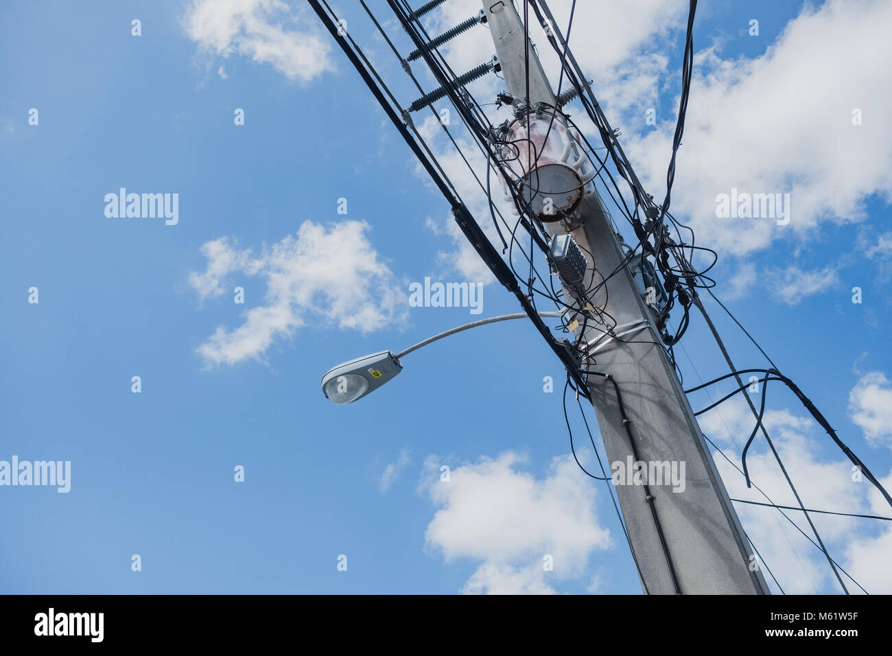 A mess of cables on a power line at Wynwood, Miami, Florida, North ...