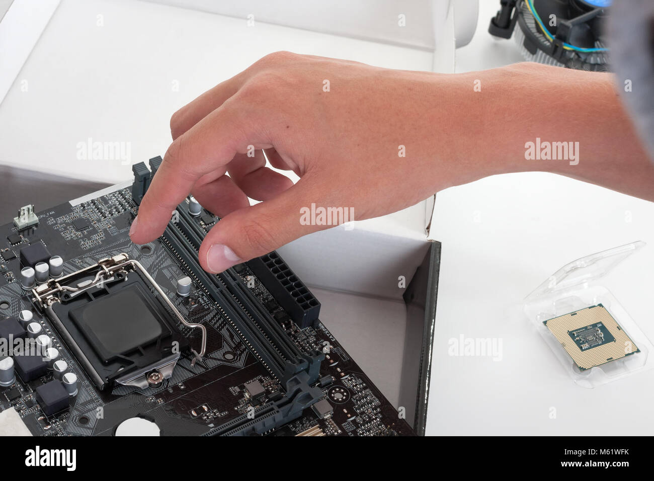 Installing processor on motherboard hi-res stock photography and images ...