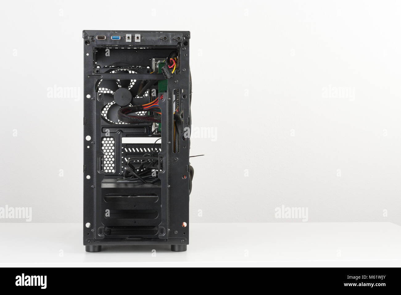 Building of PC, ATX motherboard and computer power supply unit inserted ...