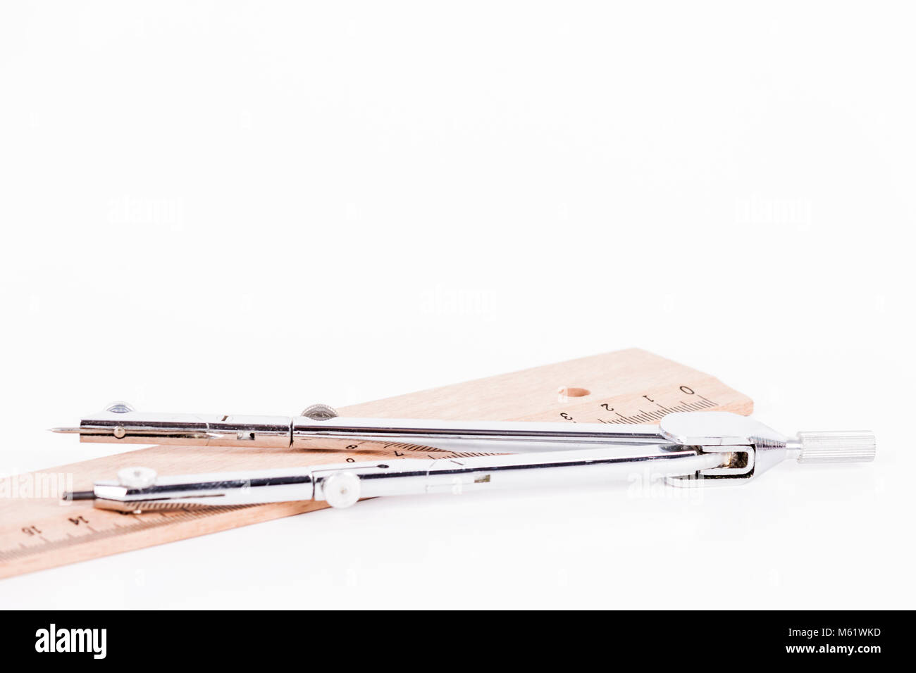 Compass and ruler isolated on white background Stock Photo - Alamy