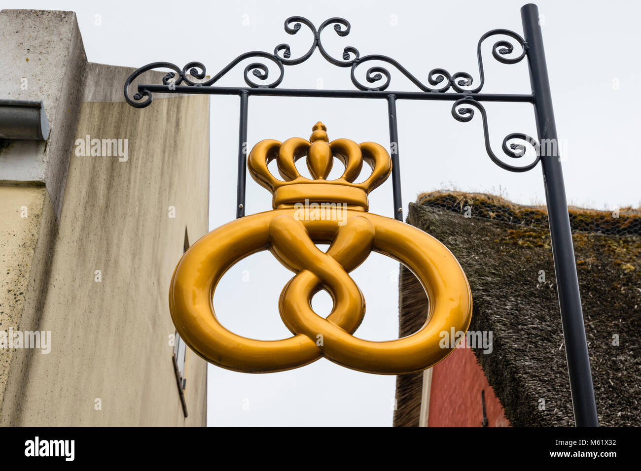 Pretzel a sign for a bakery shop Stock Photo - Alamy