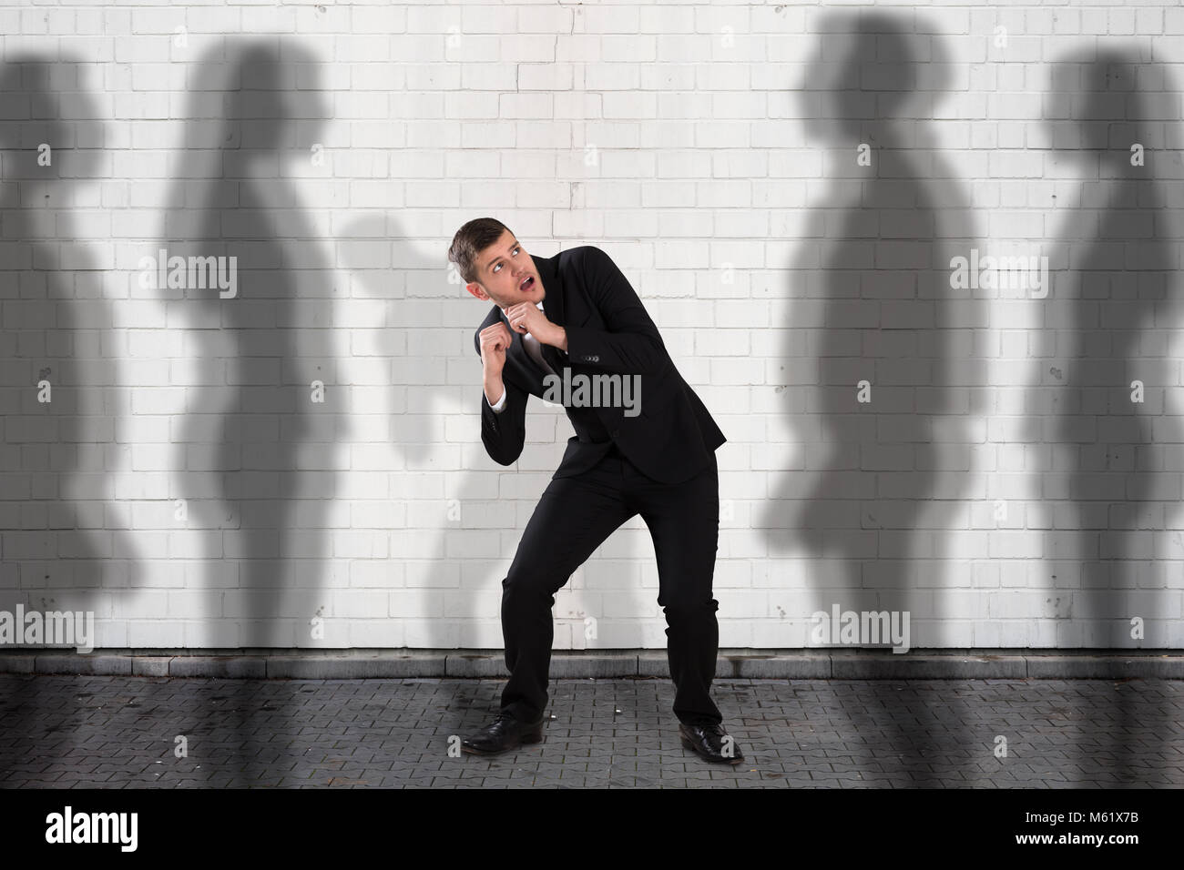 Male suit shadow hi-res stock photography and images - Alamy