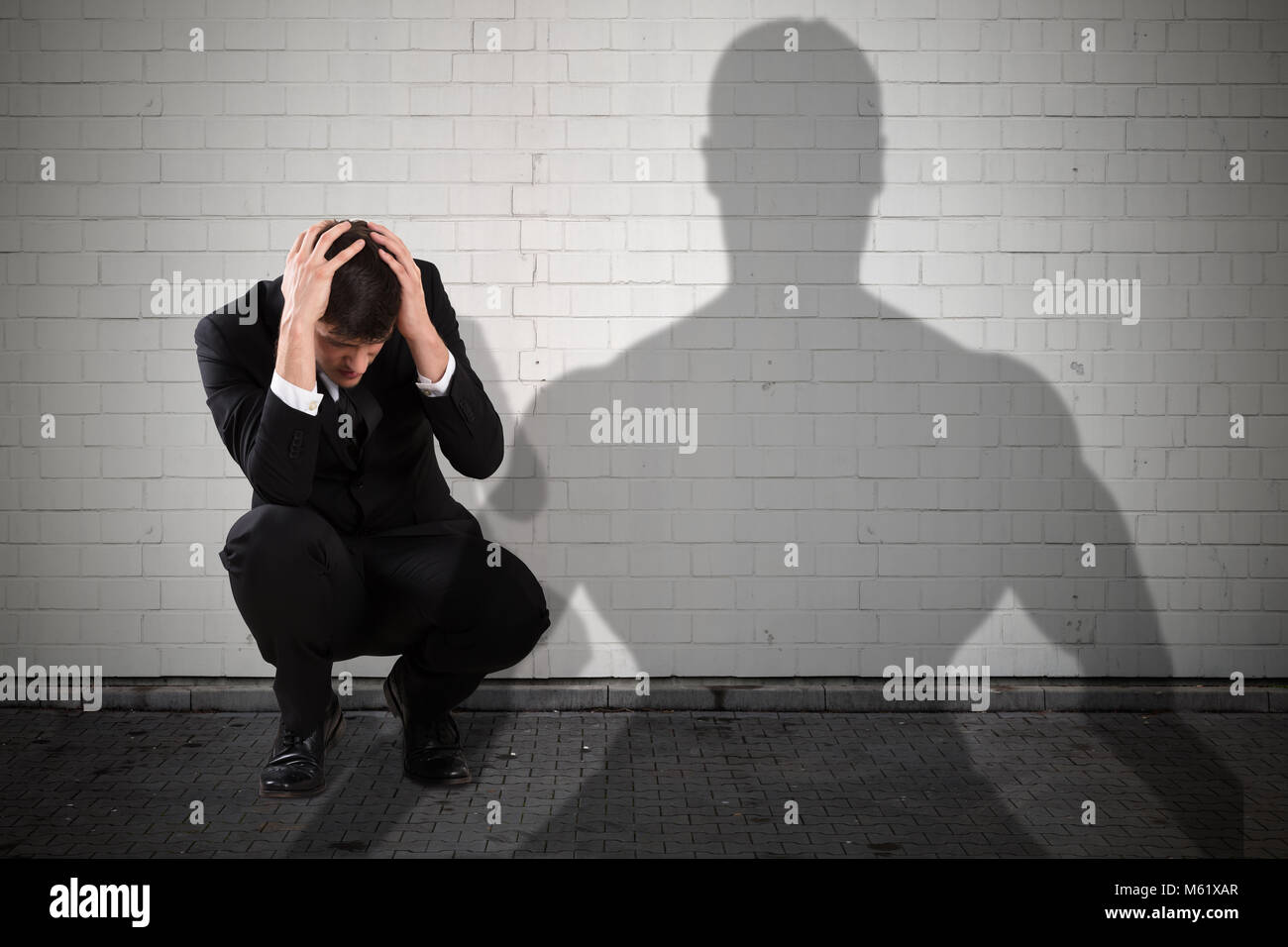 Businessman shadow hi-res stock photography and images - Alamy