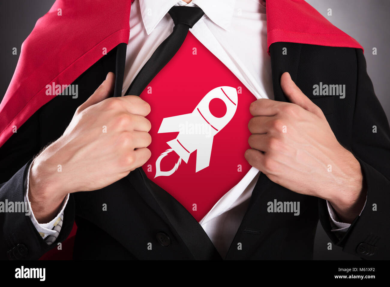 Close-up Of Businessman In Cape Opening Coat In Superhero Style Stock ...