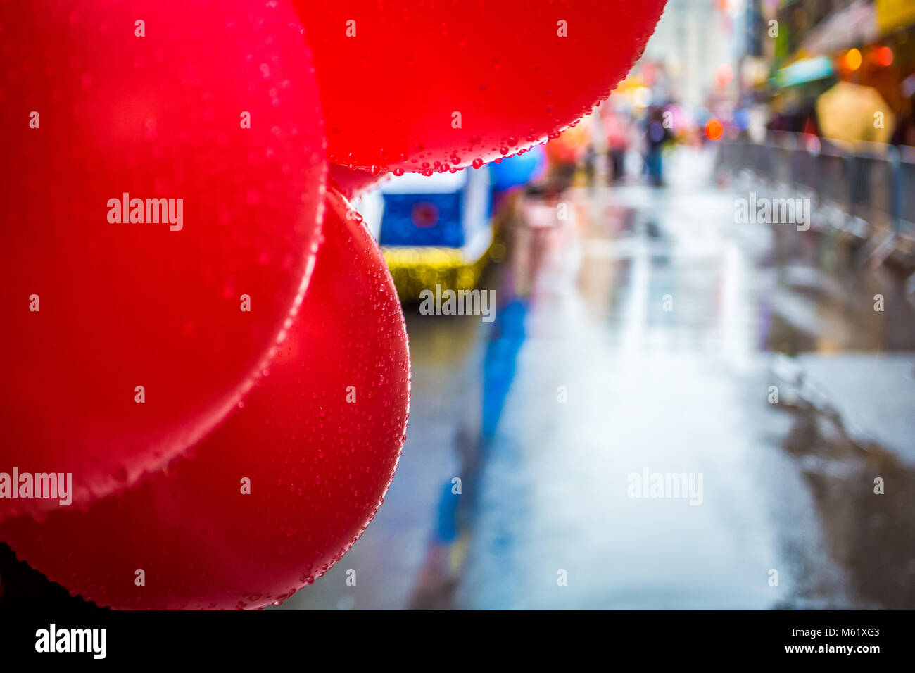 Wet Party decorations balloons outside rainy day Stock Photo - Alamy