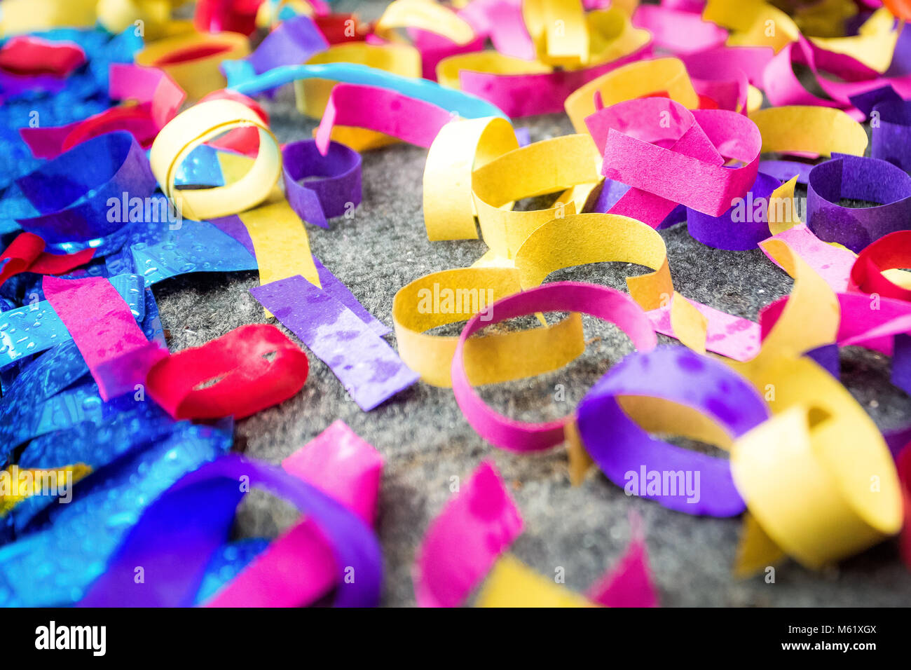 Colorful paper celebration party leftovers on the ground Stock Photo ...