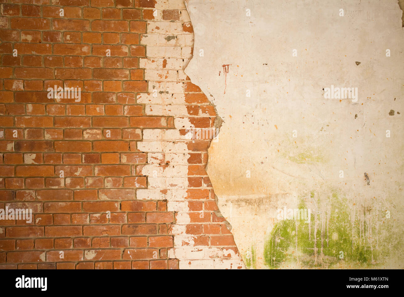 Old red brick wall with half lime plastered Stock Photo - Alamy