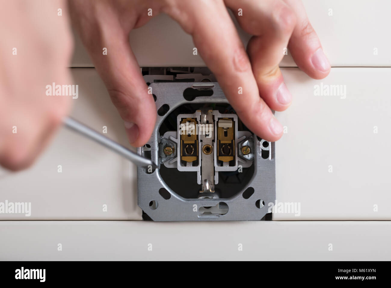 Hand hold electric screwdriver hi-res stock photography and images - Alamy