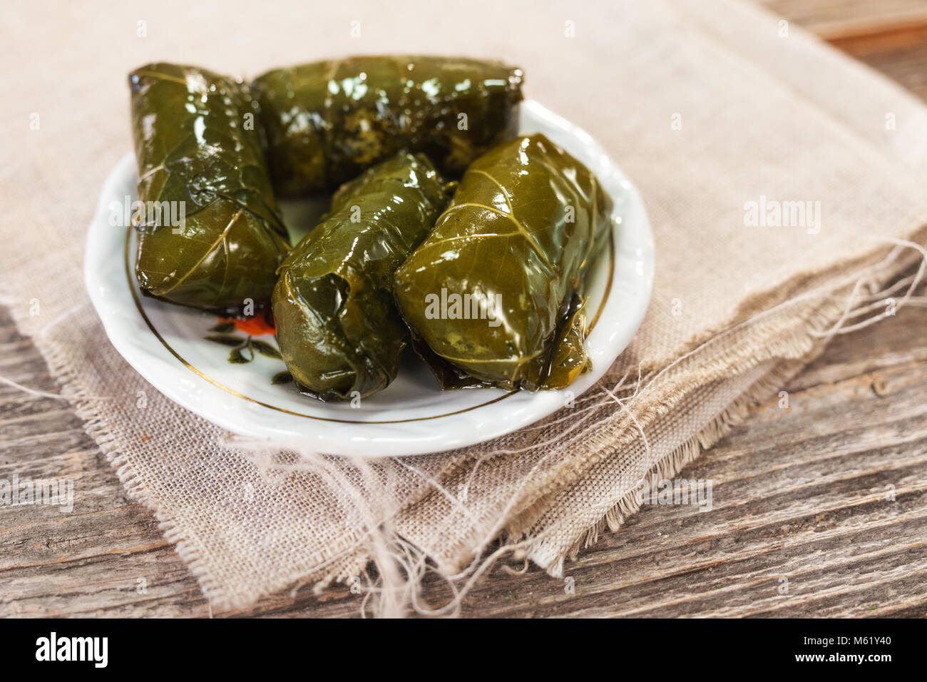 Stuffed vine leaves with rice Stock Photo - Alamy