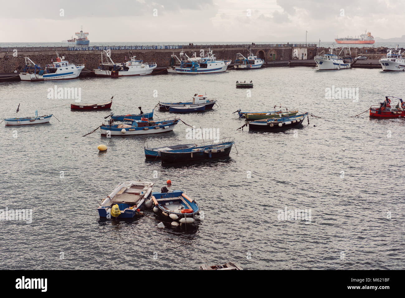 Berth with boats on sea shore Stock Photo - Alamy