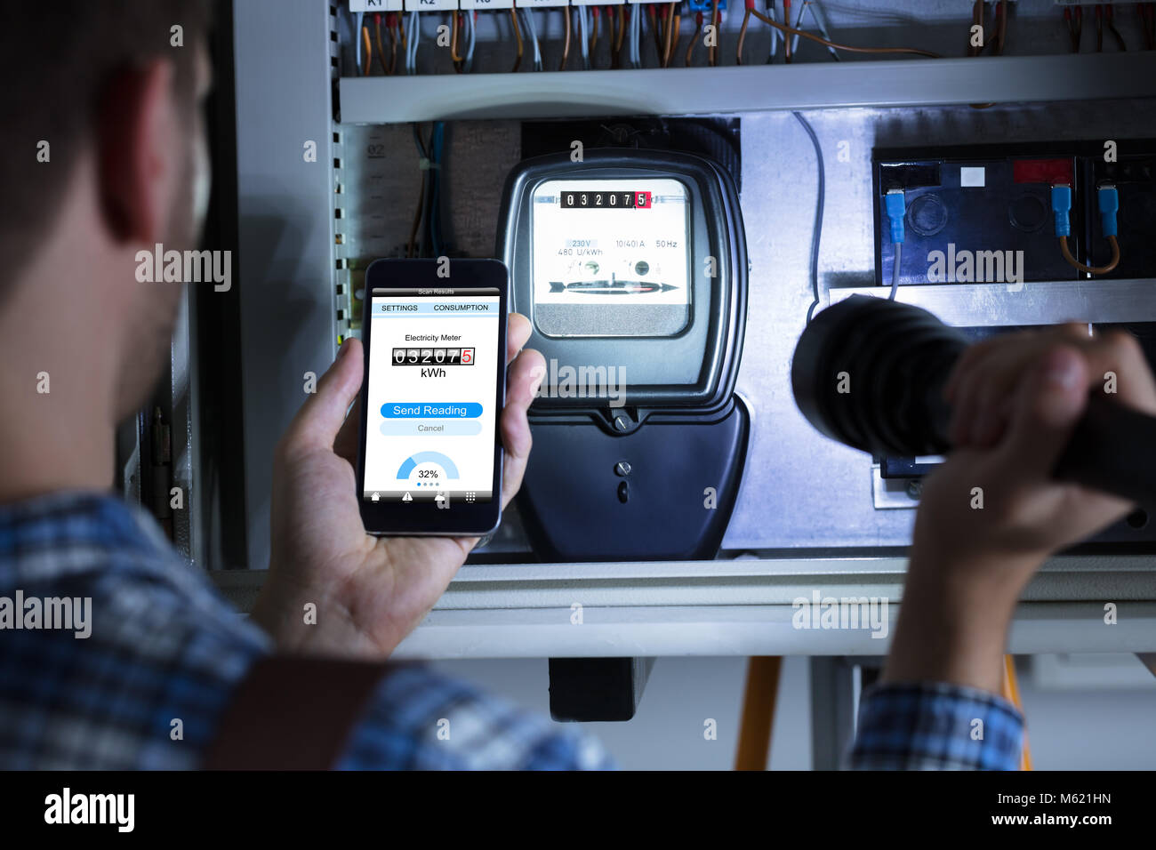 Man reading an electric meter hi-res stock photography and images - Alamy