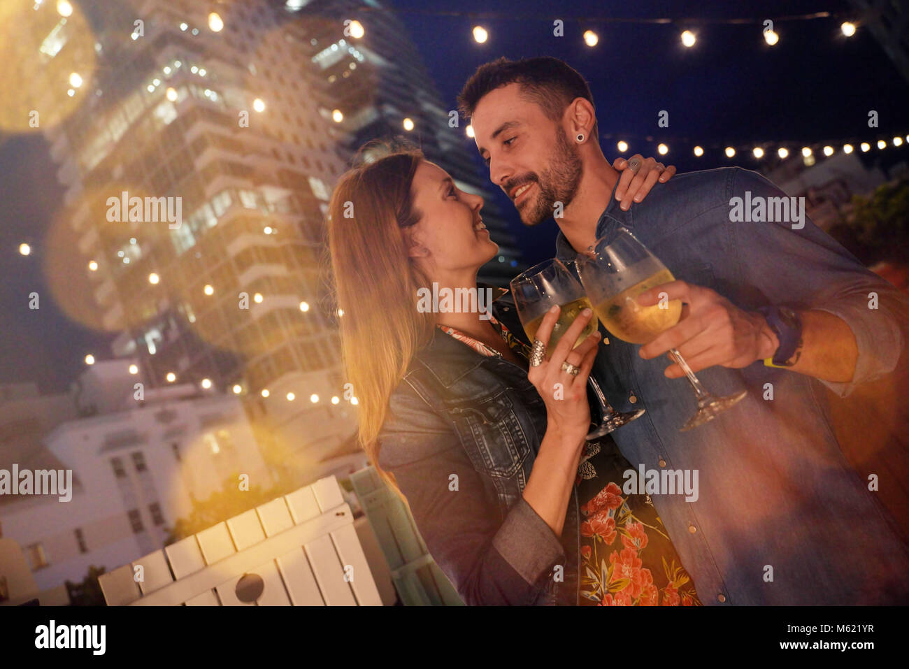 Romantic date at restaurant rooftop in Miami Stock Photo - Alamy