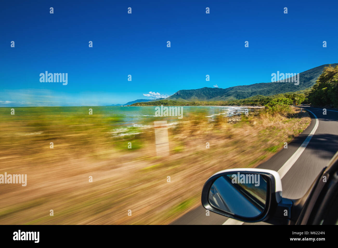 Road trip with motion blur along Ellis Beach near Palm Cove and Cairns ...