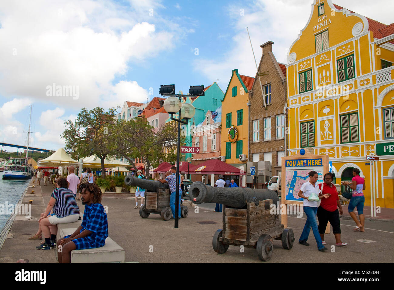 Medieval cannons at Penha building, trade arcade, colonial style ...