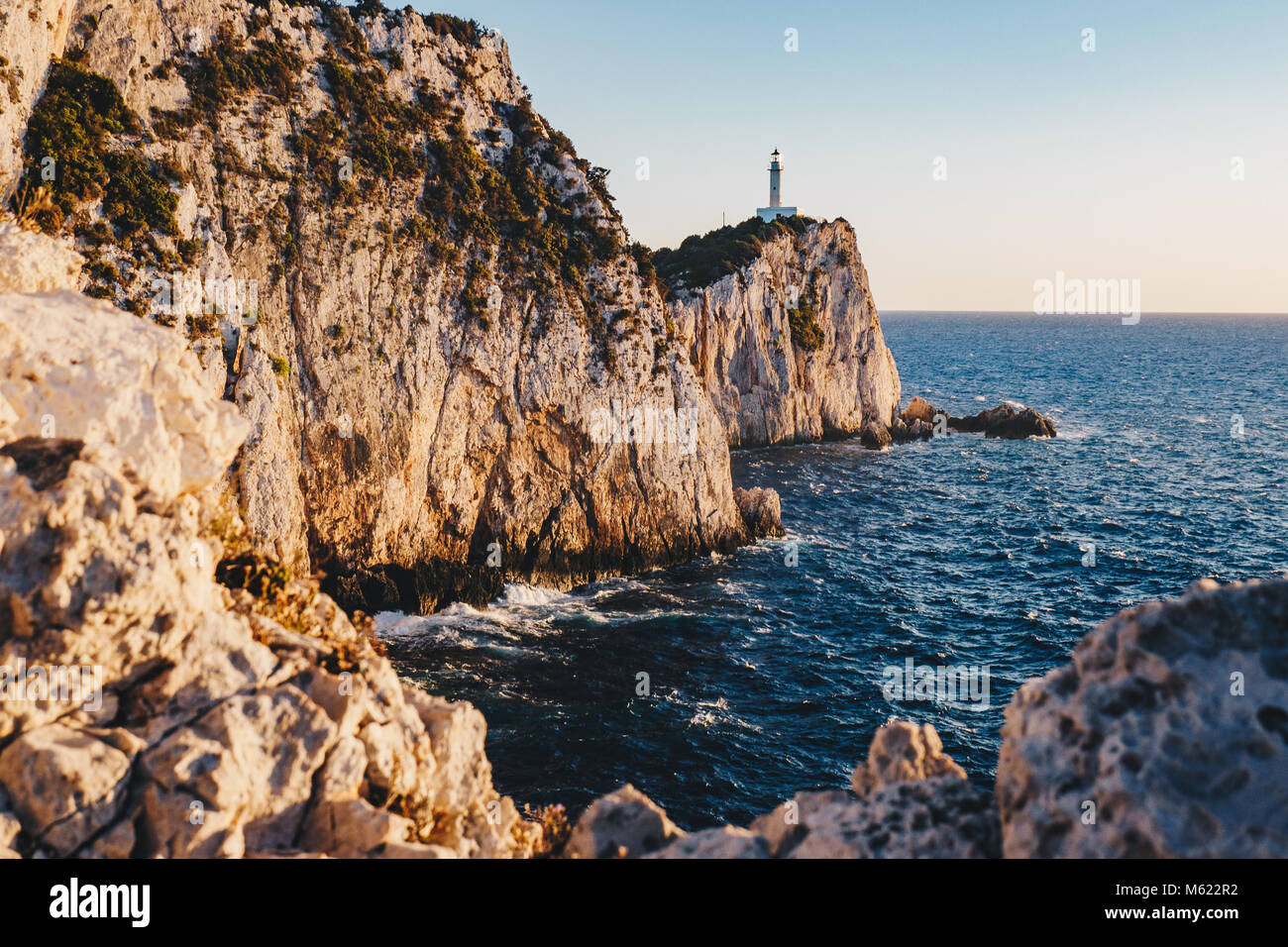 Sunset in Lefkada at the Cape Lefkatas Lighthouse , focus on the ...