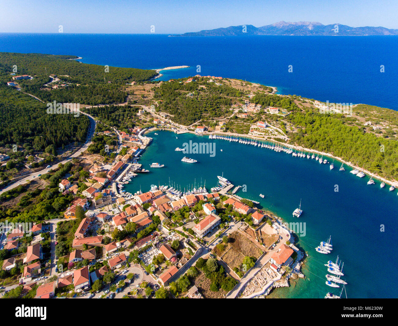 The bay of Fiskardo in Cephalonia Island, Greece (Fiscardo Stock Photo ...